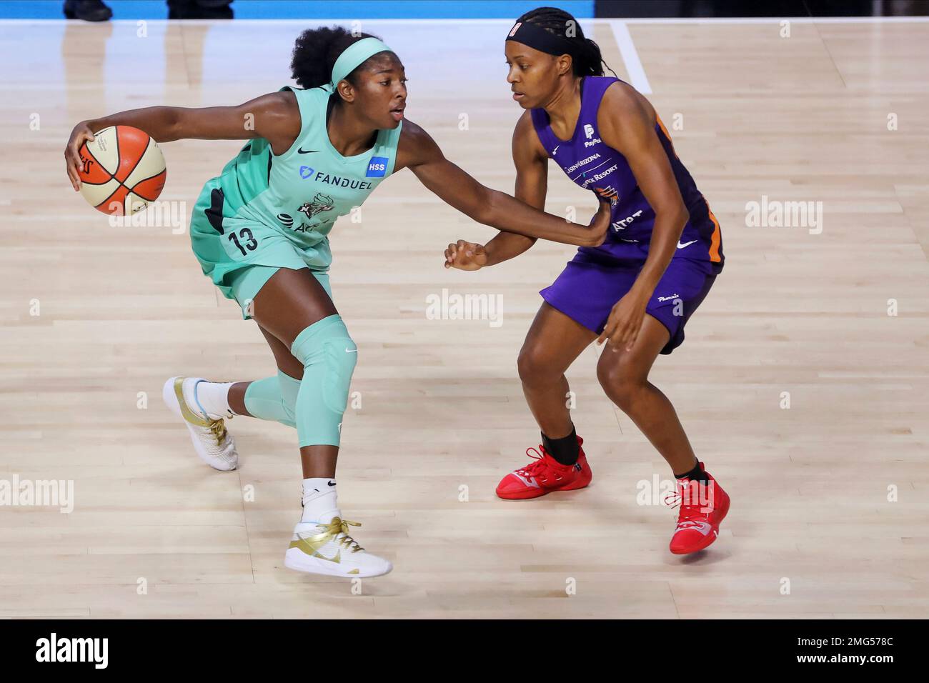 New York Liberty's Jocelyn Willoughby (13) brings the ball up as ...