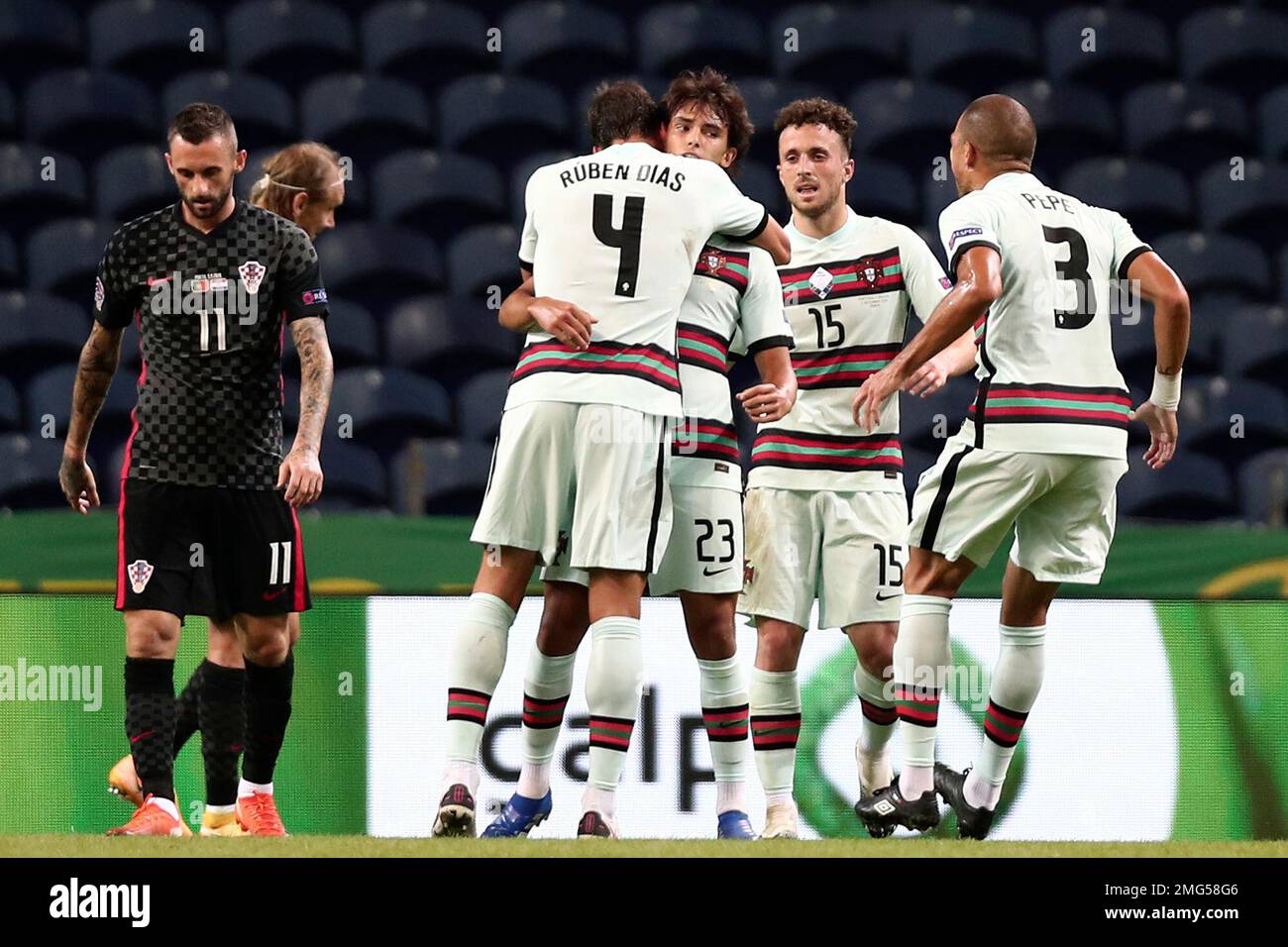 Portugal's Joao Felix celebrates with teammate Ruben Dias after scoring ...