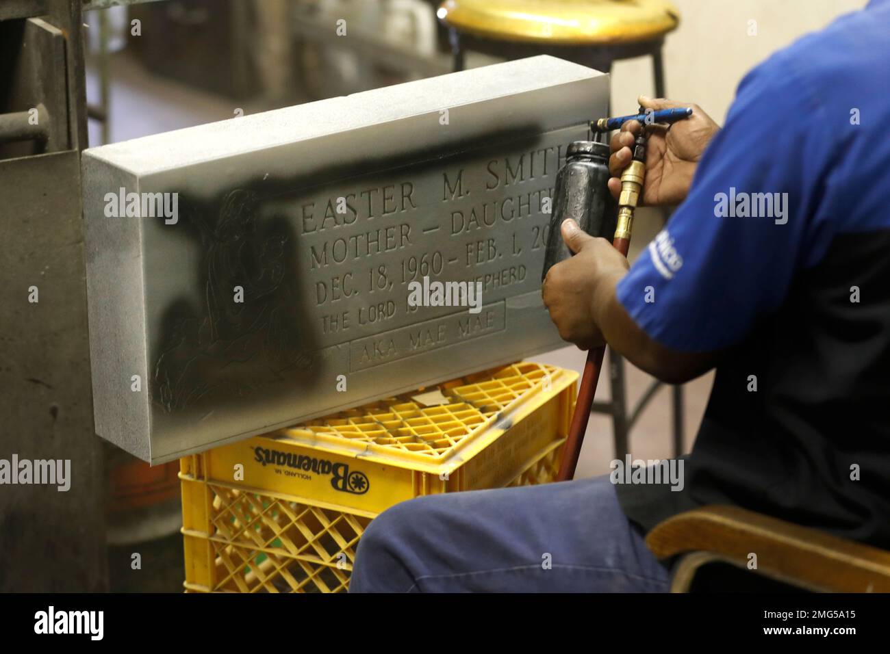 With a stencil only exposing the sandblasted letters, Thursday, May 28 ...