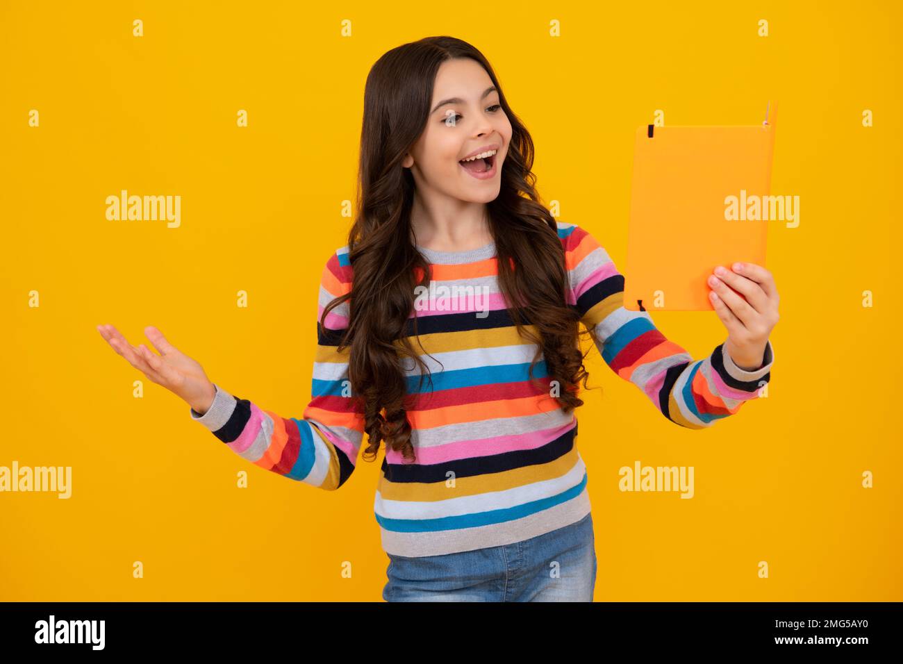 Amazed teenager. Back to school. Portrait of teenage school girl with ...