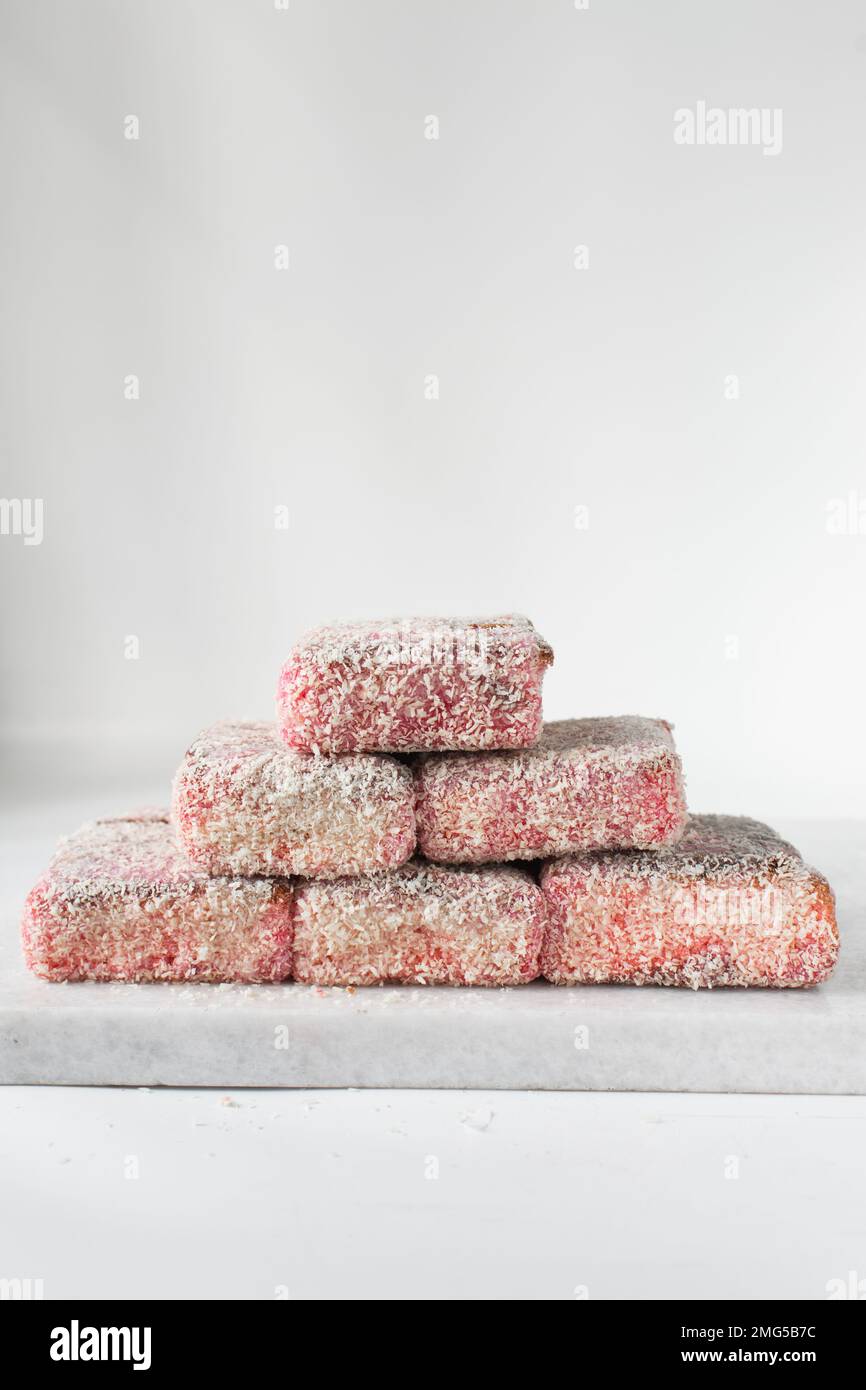 Pink lamingtons on a marble tray, Australian raspberry lamingtons, cake ...