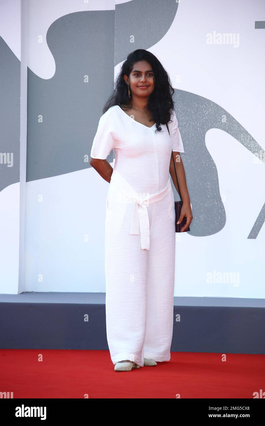 Production designer Pooja Talreja poses for photographers upon arrival ...