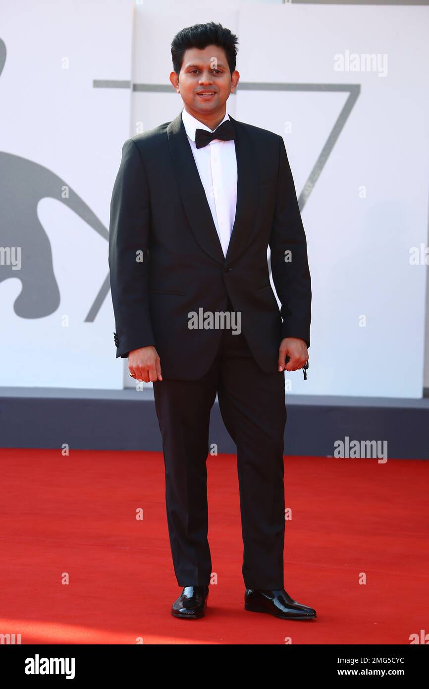 Aditya Modak poses for photographers upon arrival at the premiere of the film 'The Disciple ...