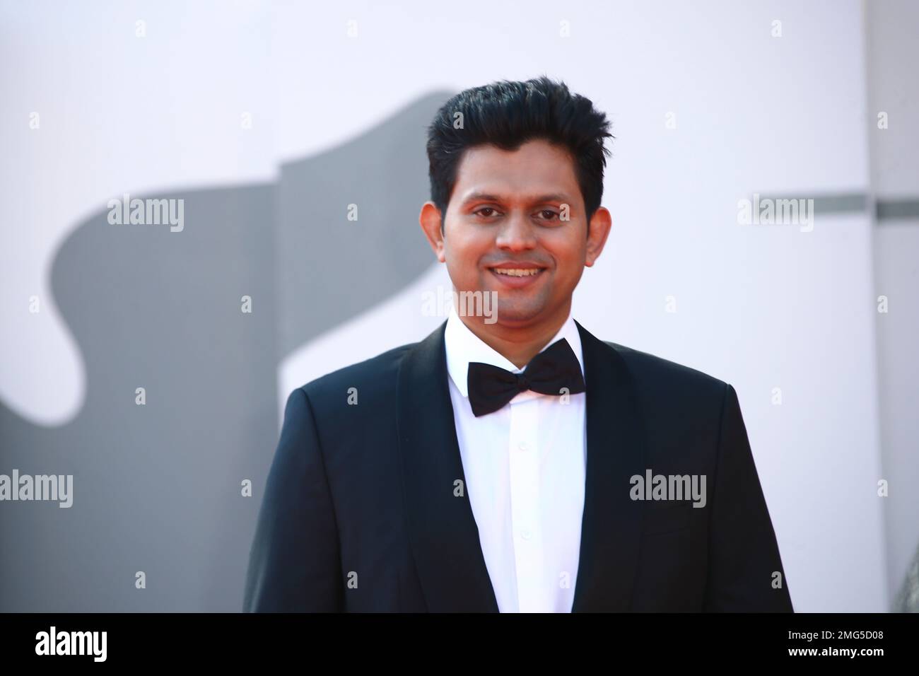 Aditya Modak poses for photographers upon arrival at the premiere of the film 'The Disciple ...