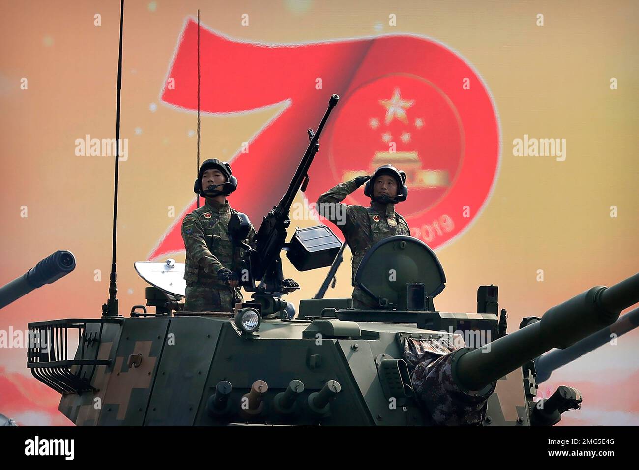 FILE - In this Oct. 1, 2019, file photo, Chinese tank crew members ...