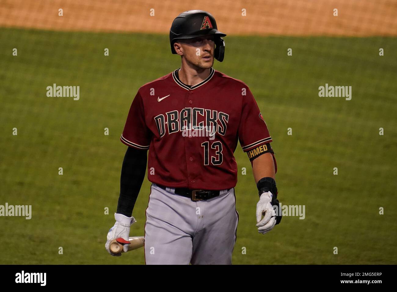 Arizona Diamondbacks' Nick Ahmed walks back to the dugout after an at ...