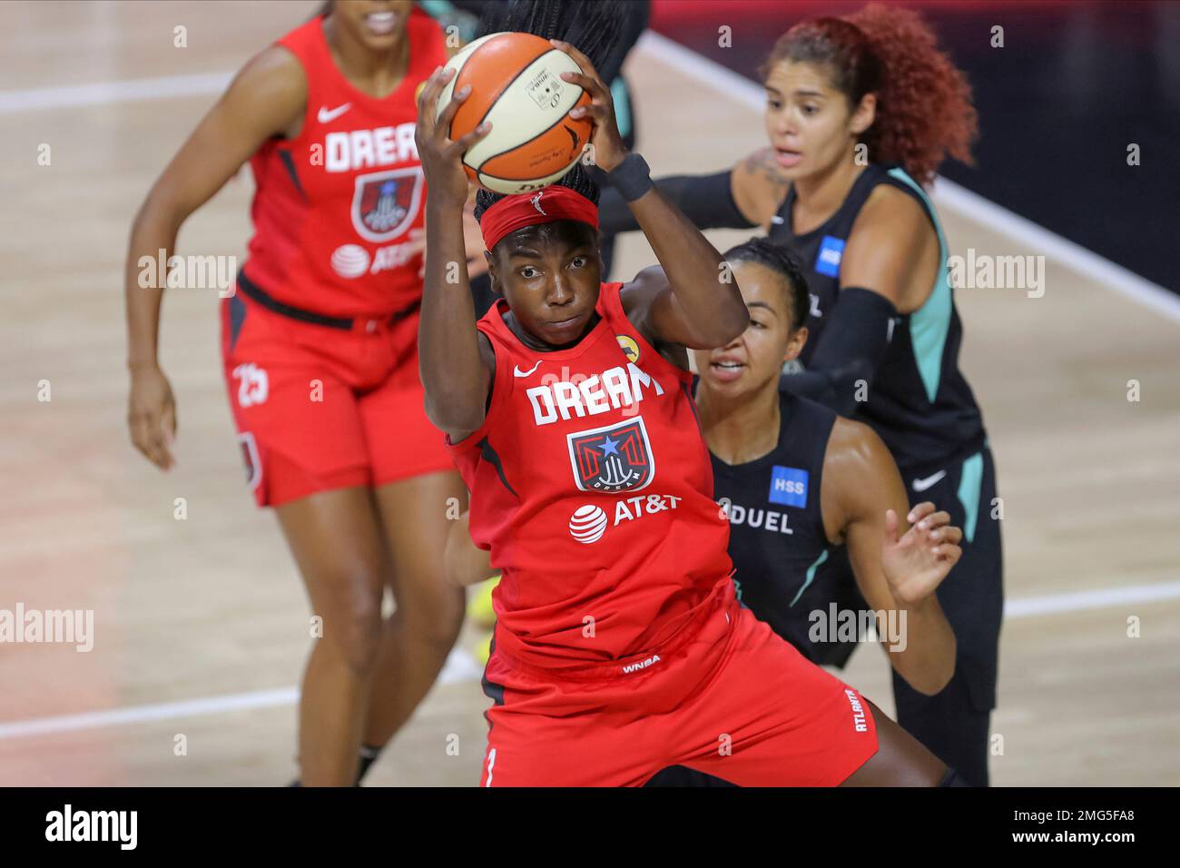 Atlanta Dream's Elizabeth Williams grabs a rebound during the first ...
