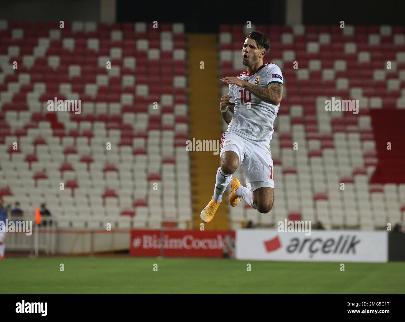 Hungary's Dominik Szoboszlai jumps to celebrate after scoring during ...
