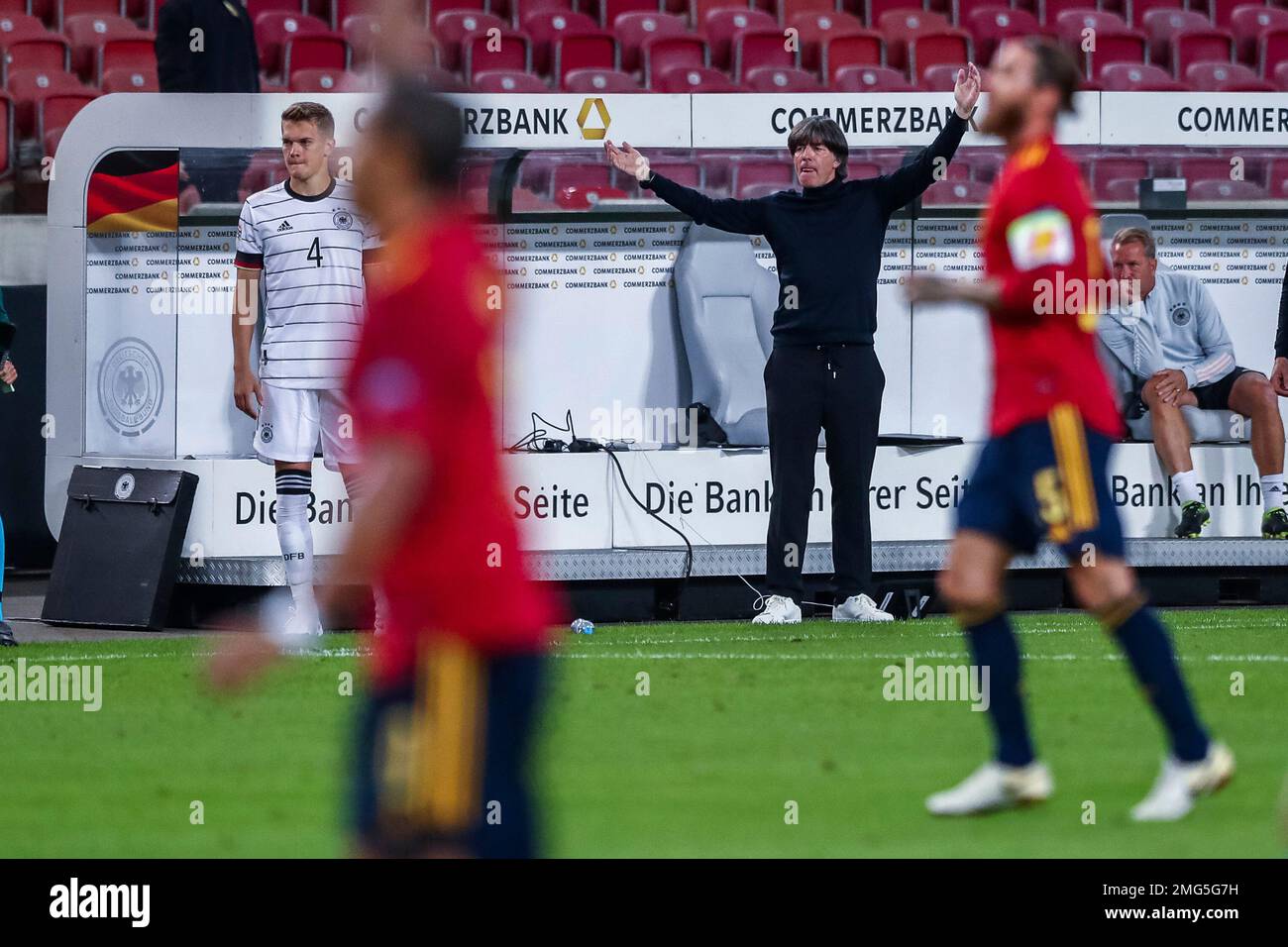 Germany head coach Joachim Low, background, gestures during the UEFA ...