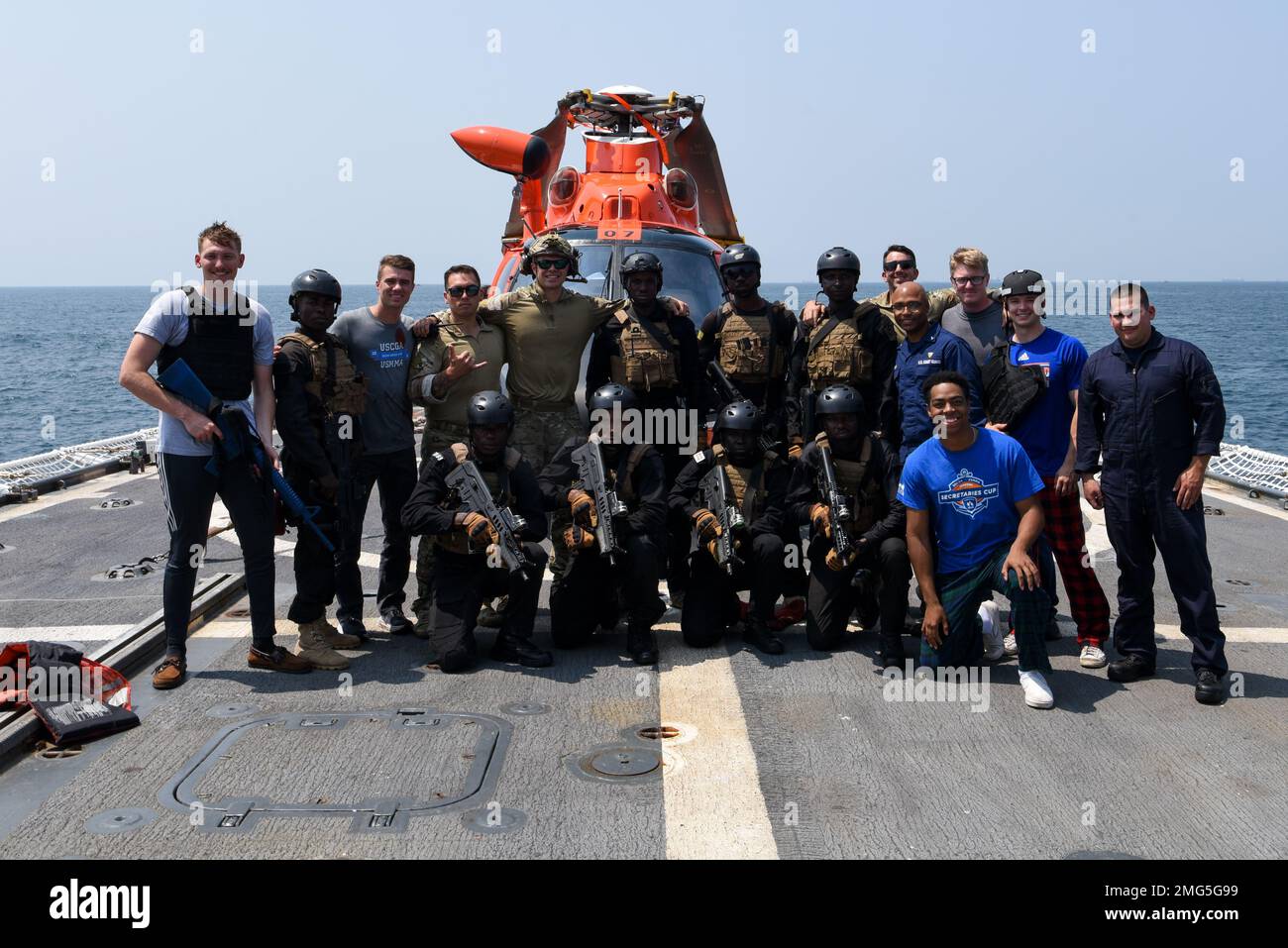 U.S. Coast Guard and Nigerian Navy members pose for a photo after ...