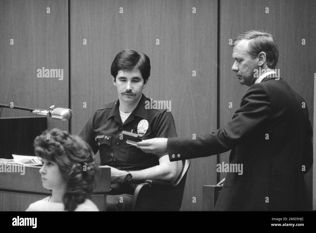 Deputy District Attorney Alan Fields, right, shows what is described as ...