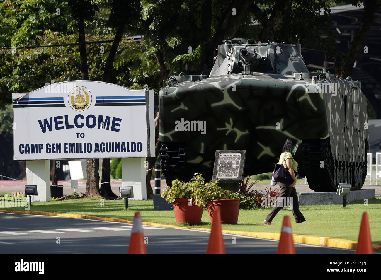 A Woman Walks Inside Camp Aguinaldo Military Headquarters Where U S