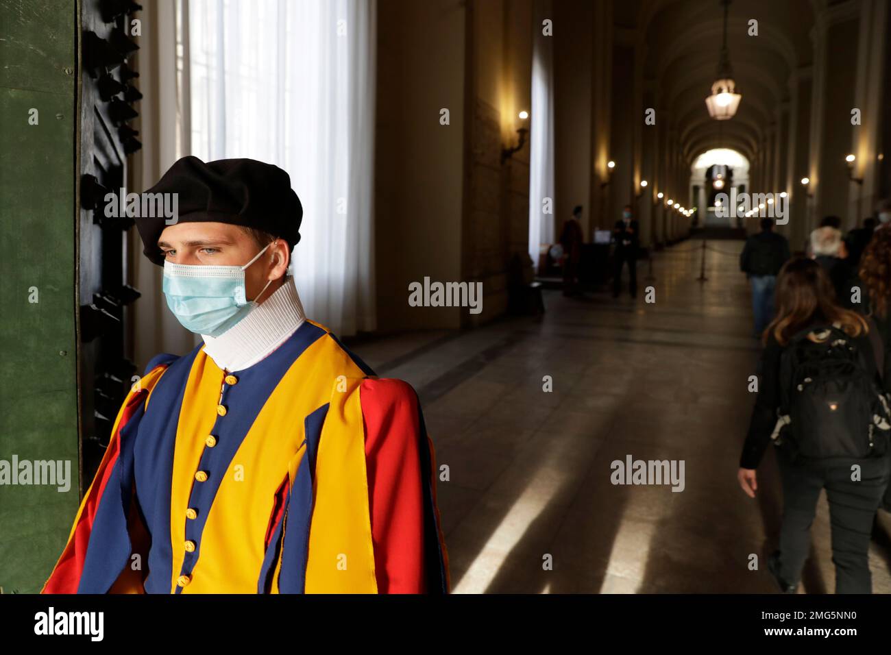 A Vatican Swiss guard wears a face mask to prevent the spread of COVID ...