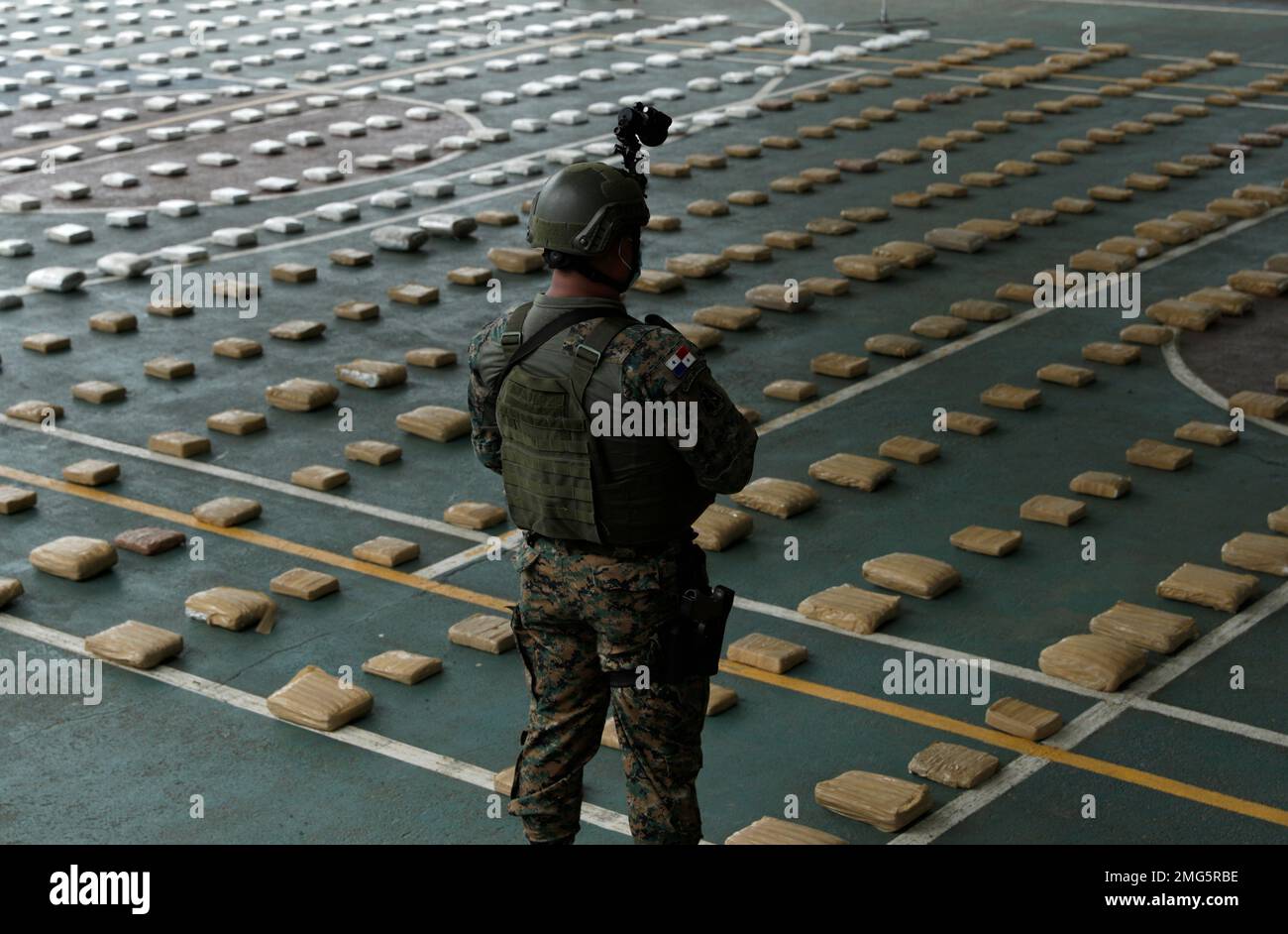 Panamanian police guard hundreds of seized packages of marijuana during ...