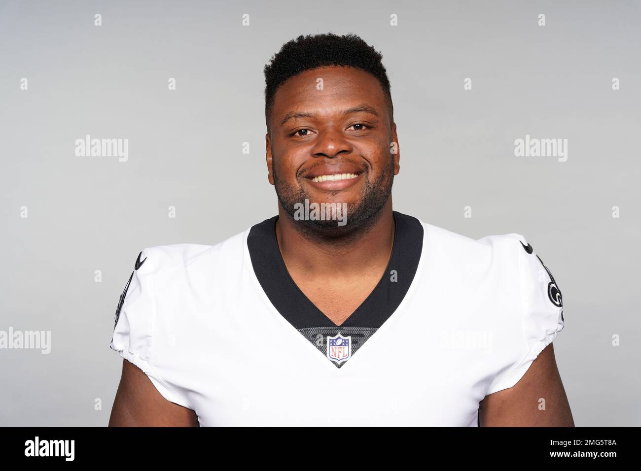 This is a photo of Cameron Tom of the New Orleans Saints NFL football ...