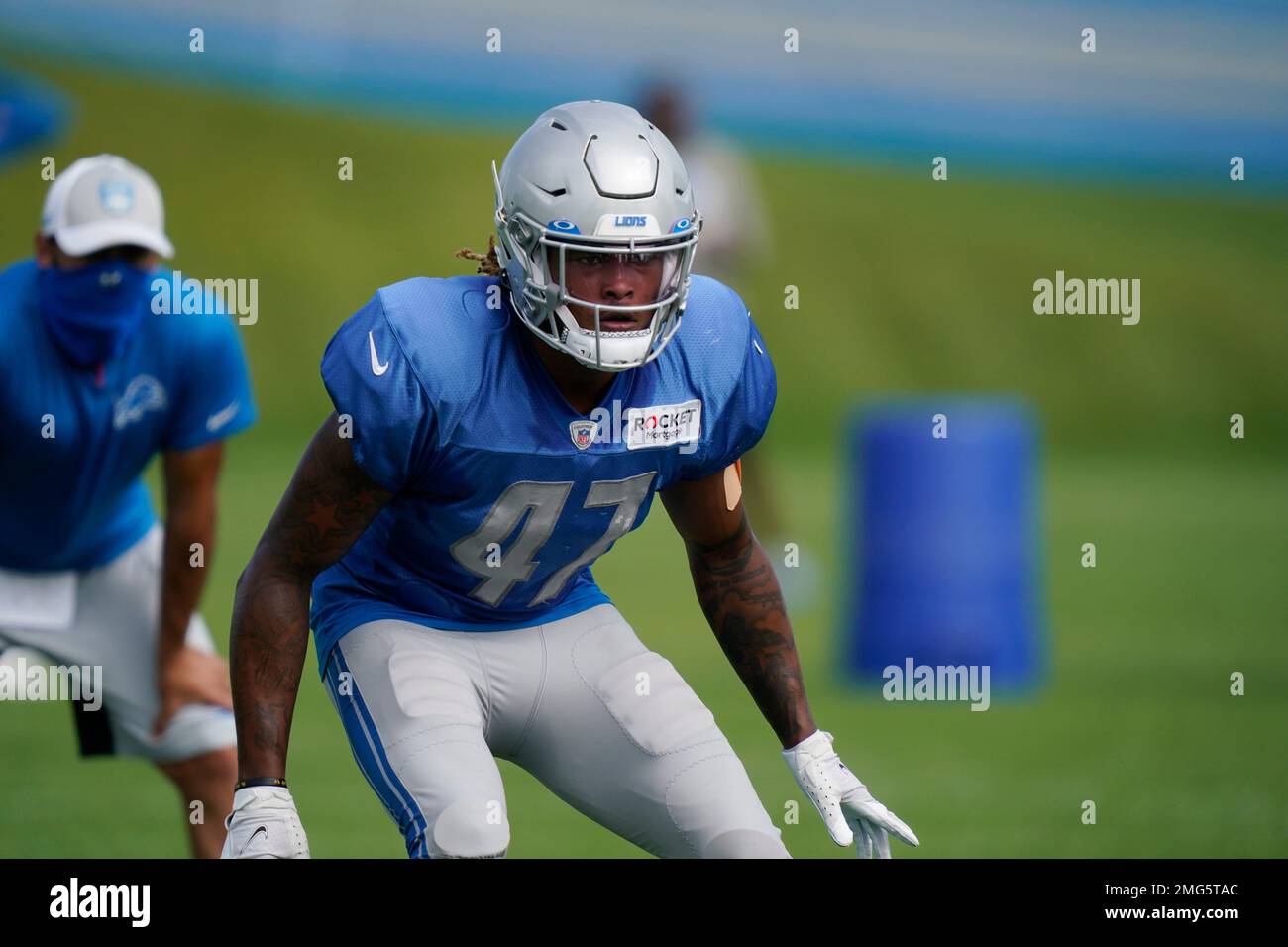 Detroit Lions safety Bobby Price runs through a during drill at the ...