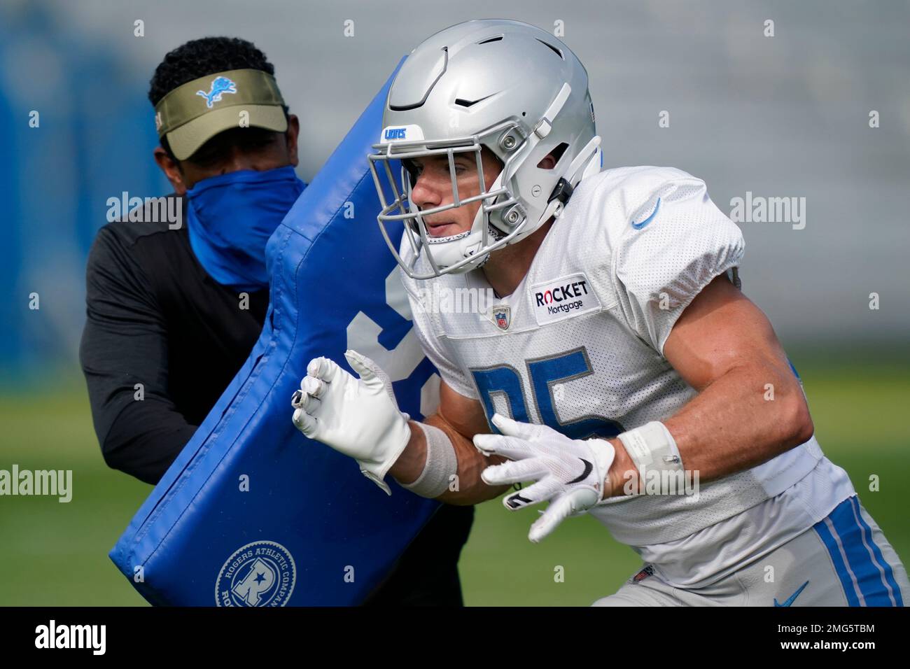 Detroit Lions wide receivers coach Robert Prince pushes Tom Kennedy ...
