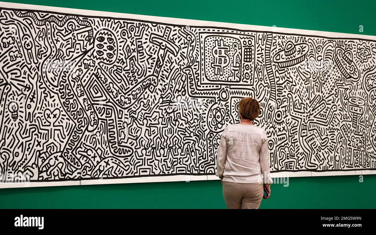 Visitors watching artwork by US artist Keith Haring during an ...
