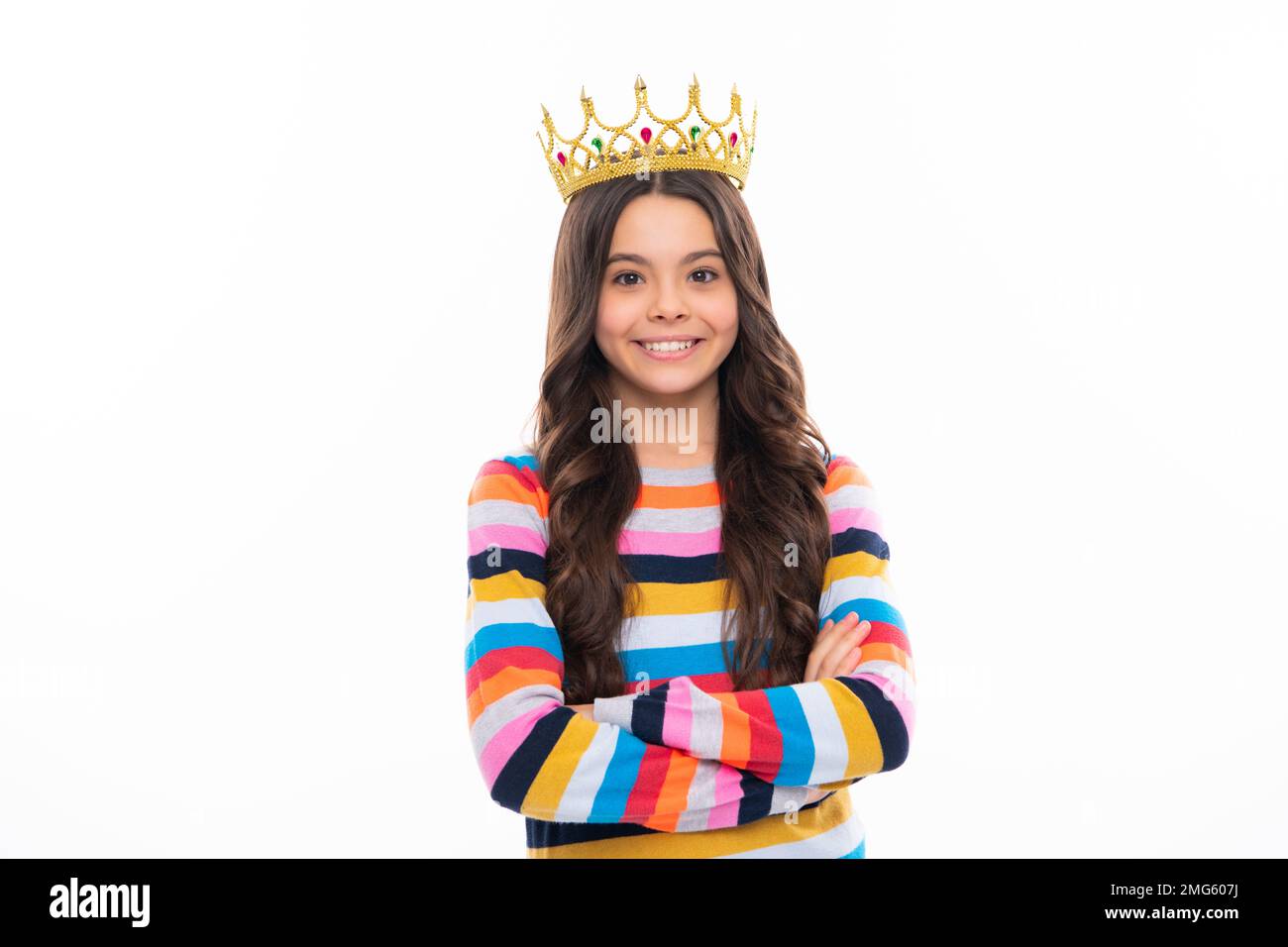 Girls birthday party, funny kid in crown. Imagine herself a queen ...