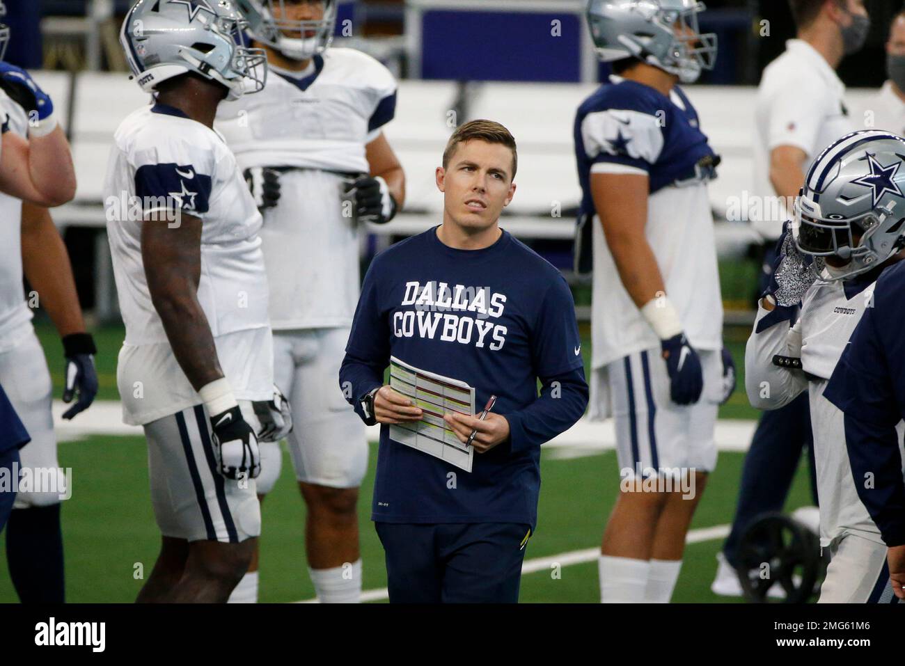 Dallas Cowboys offensive coordinator Kellen Moore watches practice ...