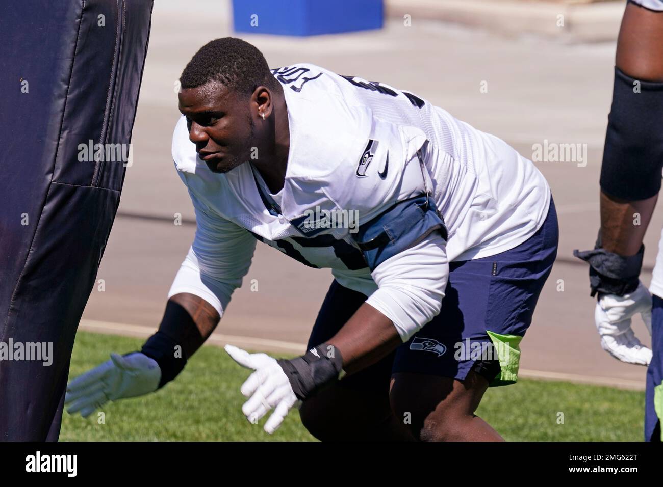 Seattle Seahawks defensive tackle Poona Ford runs through a drill ...