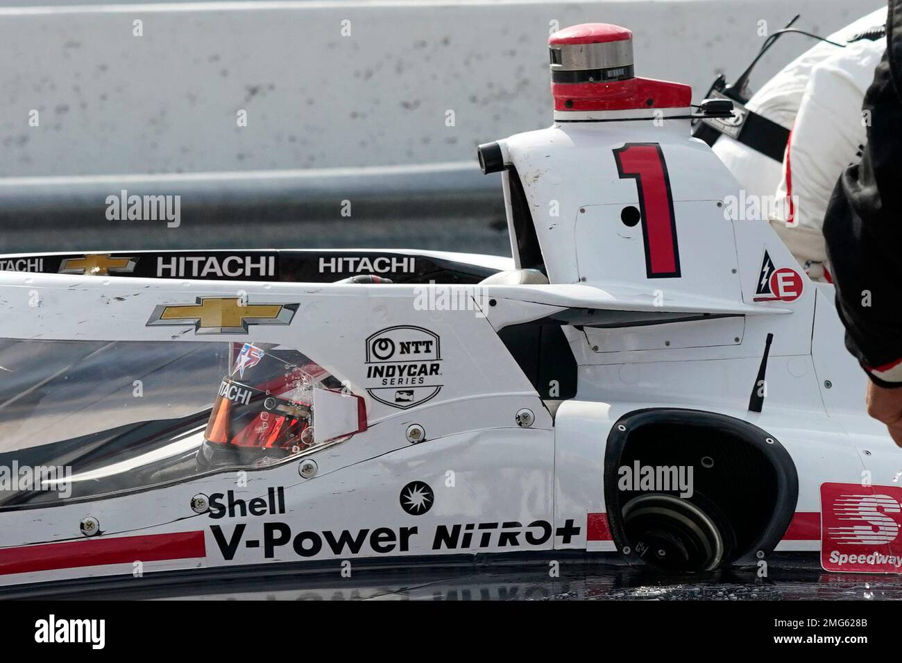 Josef Newgarden makes a pitstop during the IndyCar auto race at World ...