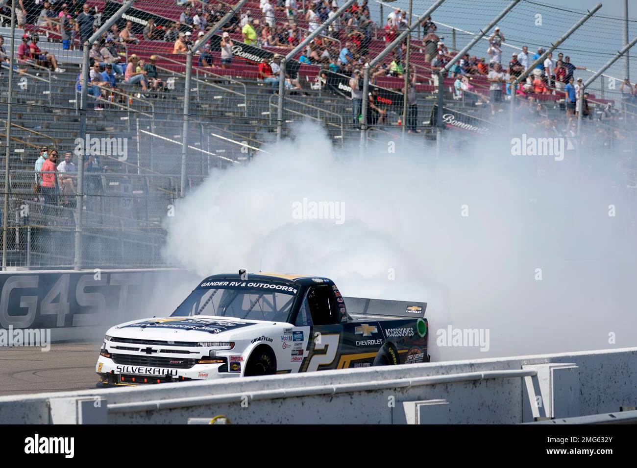 Sheldon Creed celebrates after winning a NASCAR Truck Series race at ...