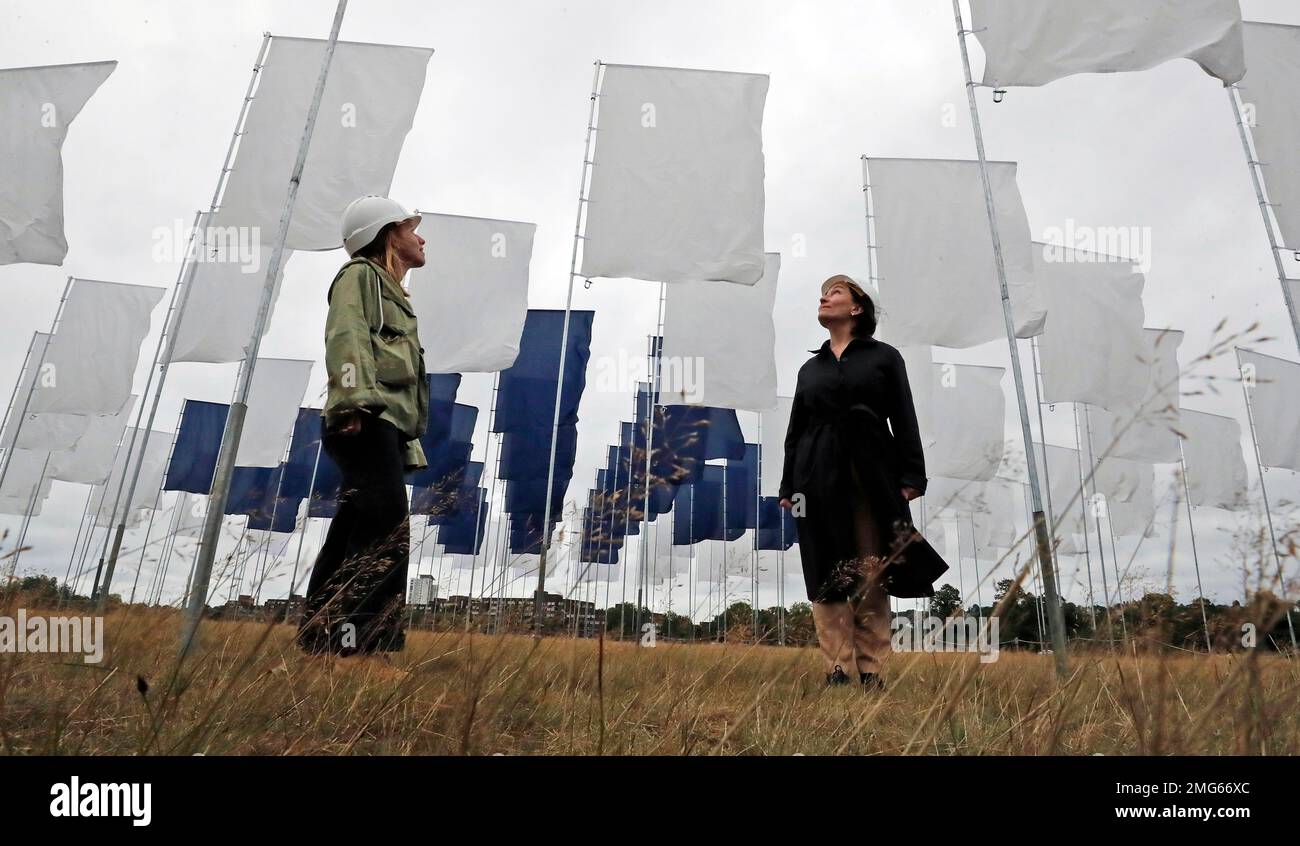 Nurse Angela Helleur, right, is guided through Luke Jerram's In ...