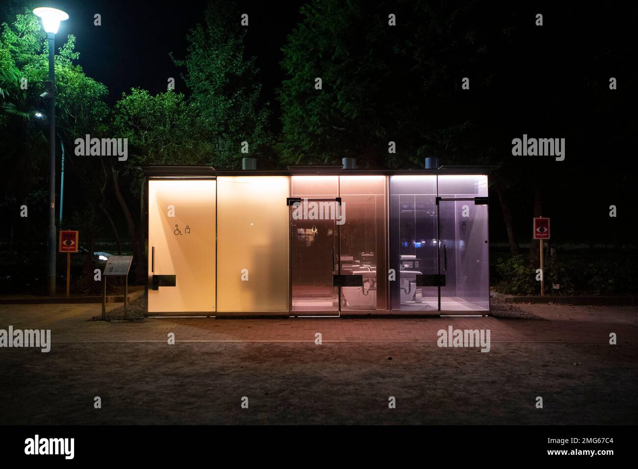 This photo shows the transparent glass toilets at Yoyogi Hukamachi Mini ...