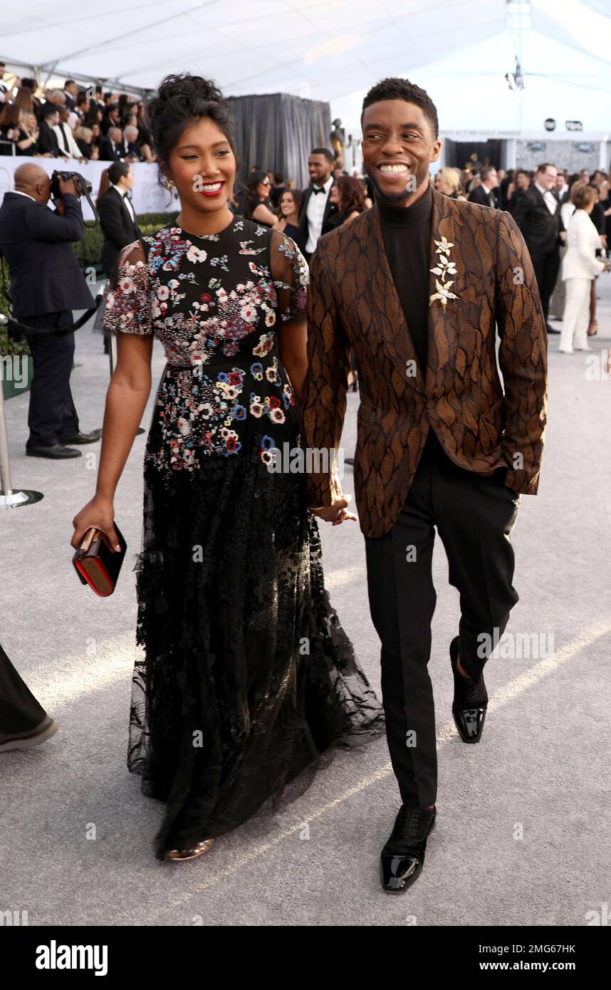 FILE - In this Jan. 27, 2019 file photo, Chadwick Boseman, right, and ...