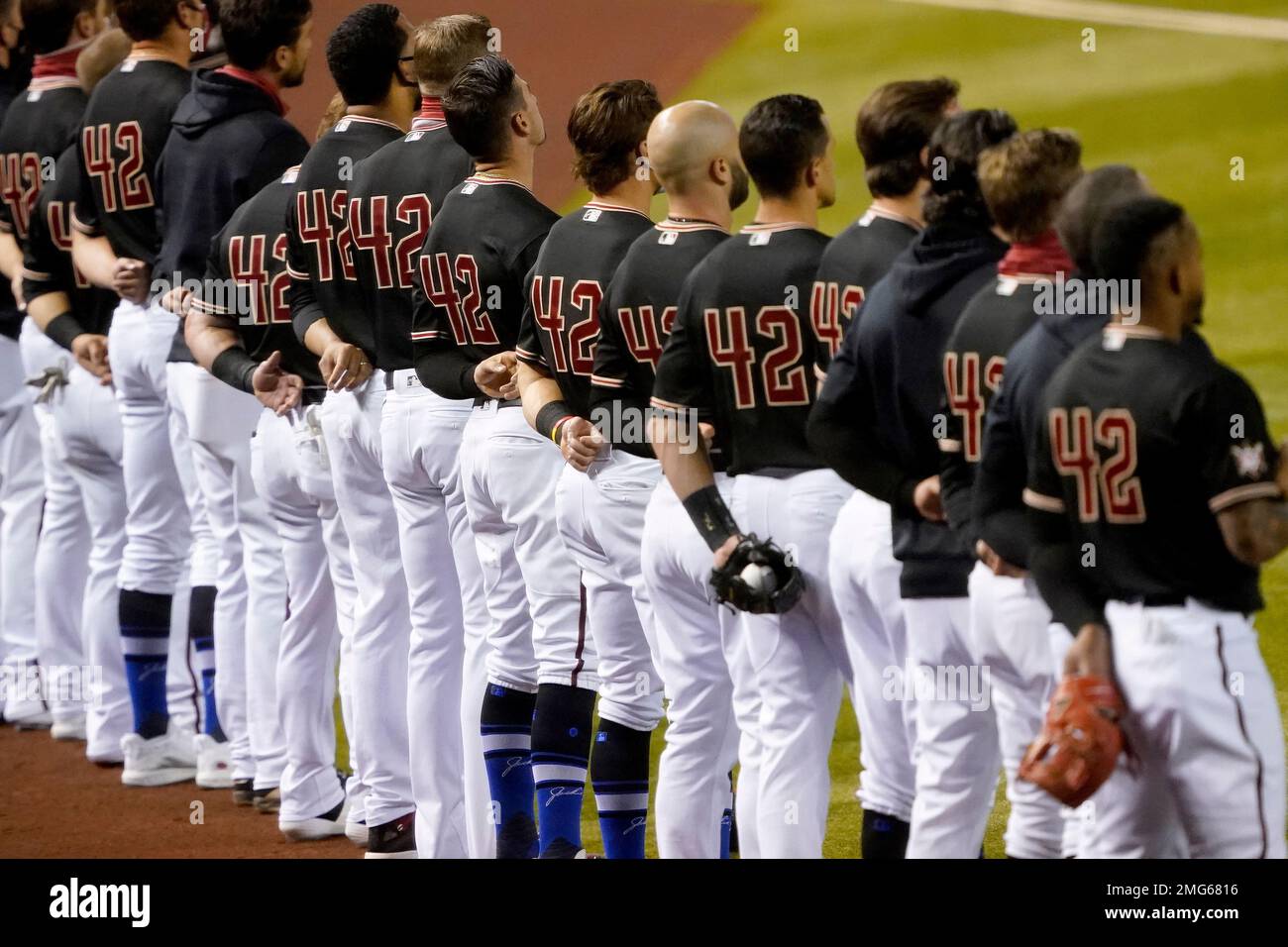 The Arizona Diamondbacks line up wearing number 42 in honor of Jackie ...