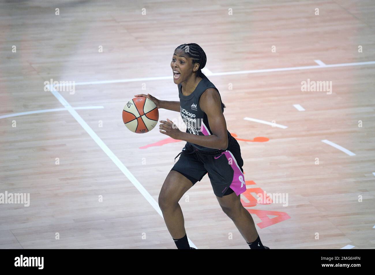 Chicago Sky guard Sydney Colson brings the ball up the court during the ...