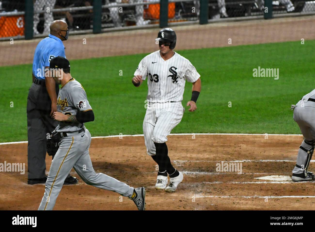 Chicago White Sox's James McCann (33) scores during the second inning ...