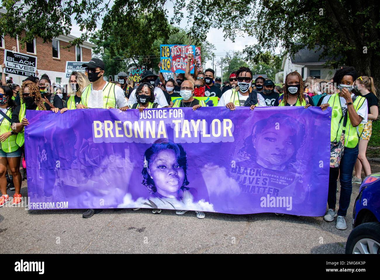 Protesters participate in the Good Trouble Tuesday march for Breonna ...