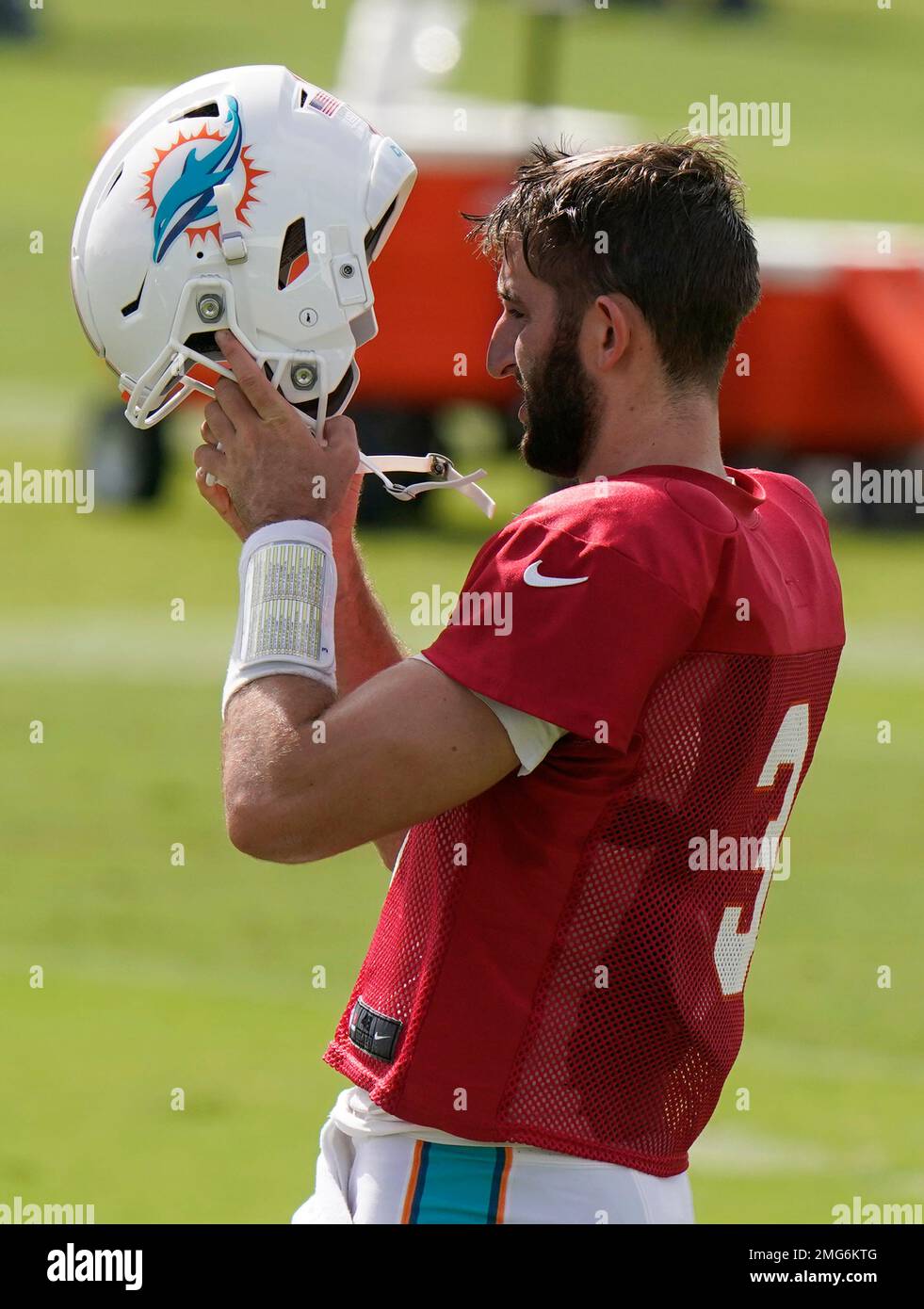 Miami Dolphins quarterback Josh Rosen (3) puts on his helmet during ...