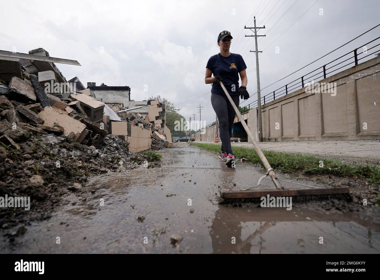 Angela Martin helps to clean up a department of corrections building ...
