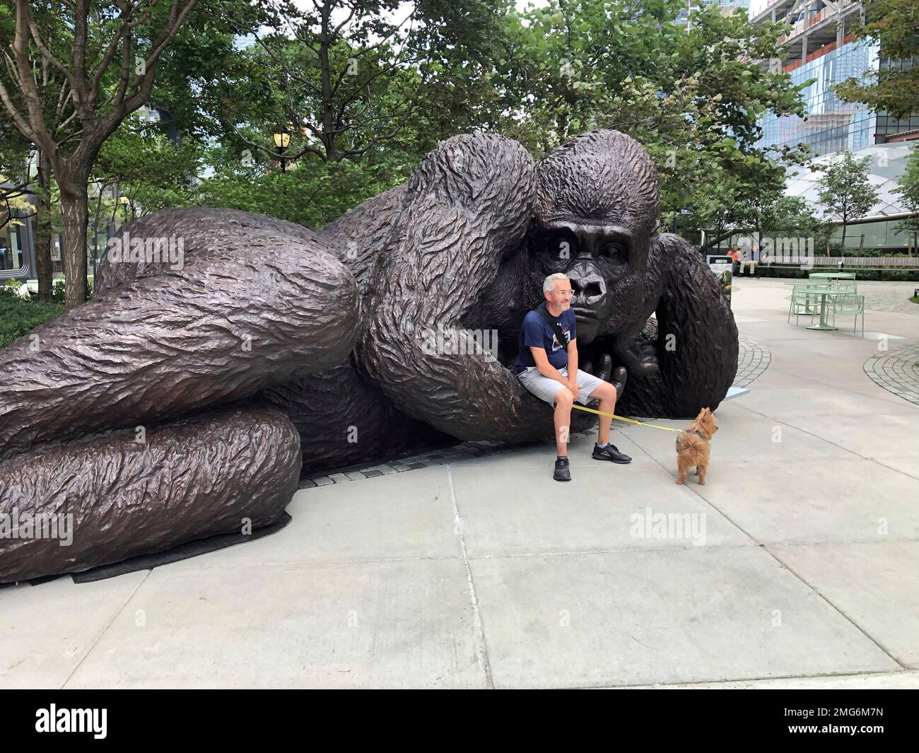 Robert Booz poses for a photo in the hand of a four-and-a-half ton ...