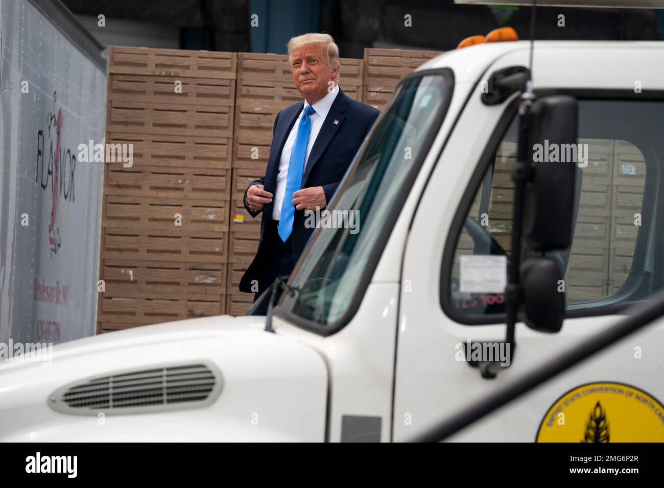 President Donald Trump arrives to deliver remarks on the "Farmers to ...