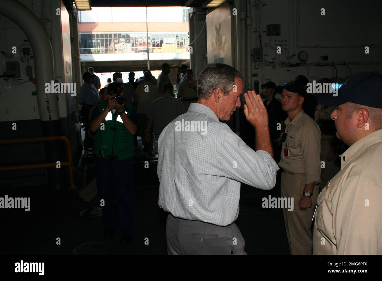 President George W. Bush Visit - 26-HK-6-257. POTUS indoors with ...