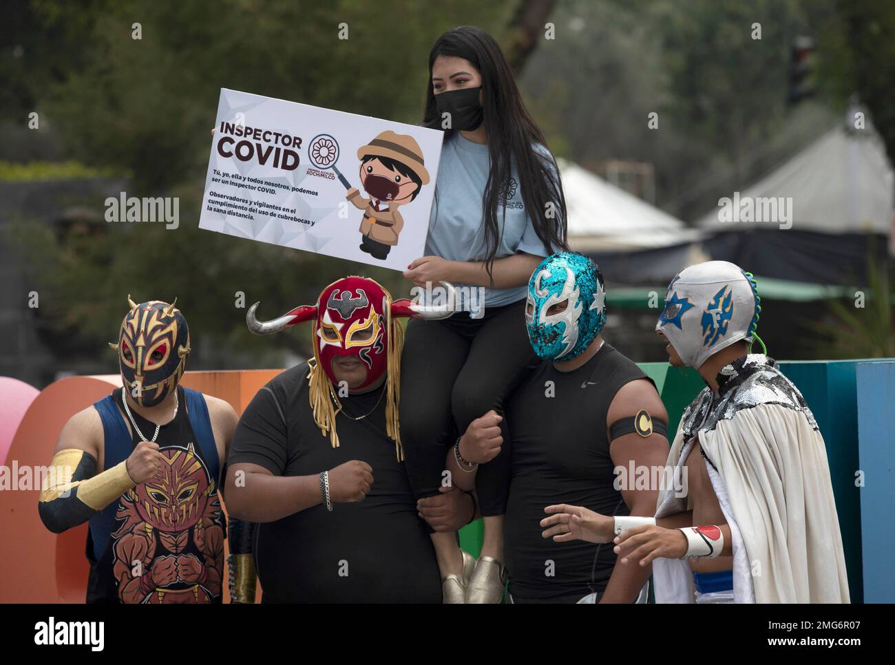 Mexican Lucha Libre fighters pose for a photo during a campaign to ...