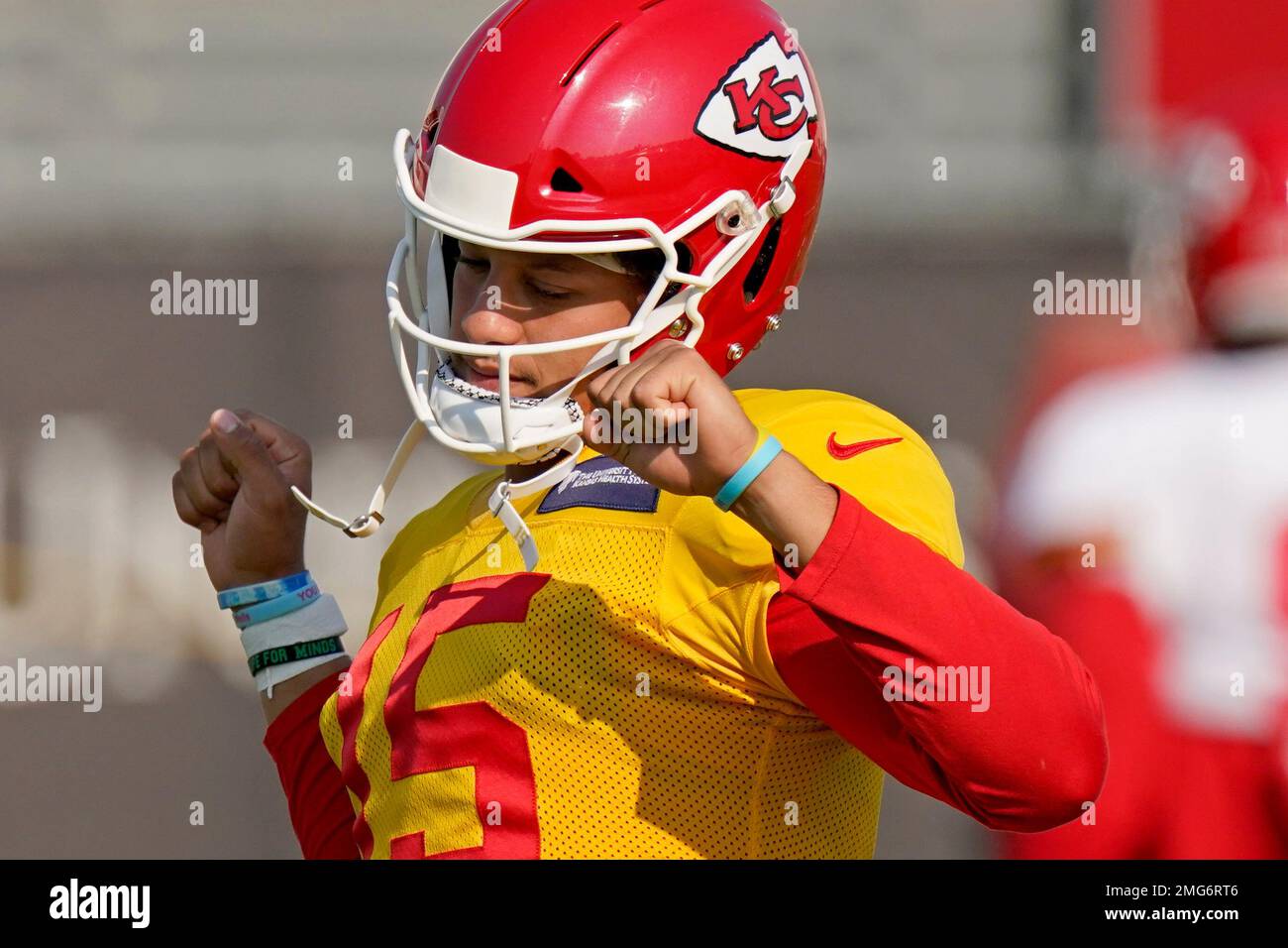 Kansas City Chiefs quarterback Patrick Mahomes stretches during an NFL ...