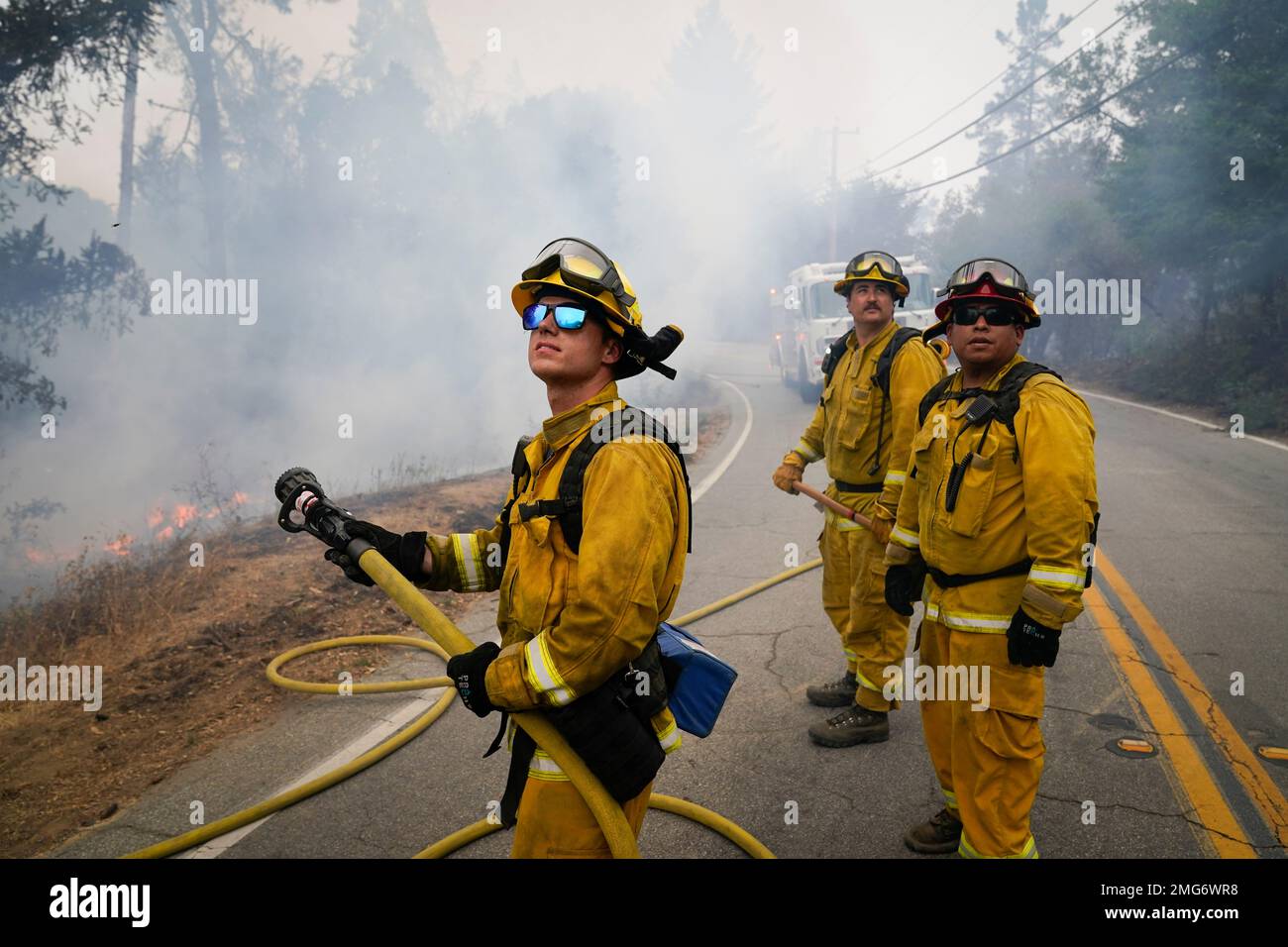 Firefighters Cody Nordstrom, Kyle Harp and Robert Gonzalez, from left ...