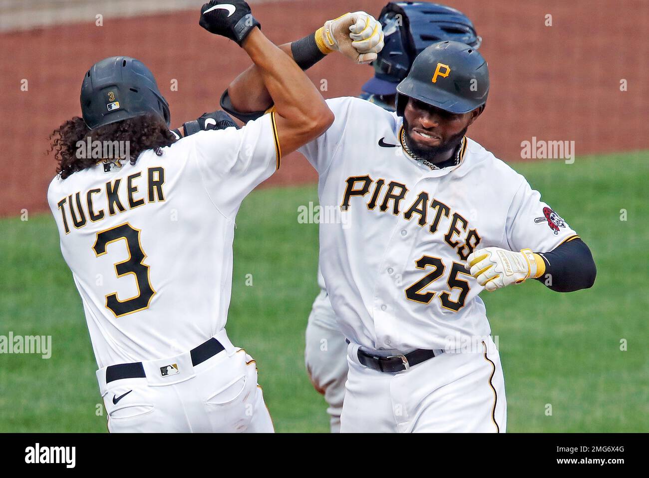 Pittsburgh Pirates' Gregory Polanco (25) celebrates with Cole Tucker ...