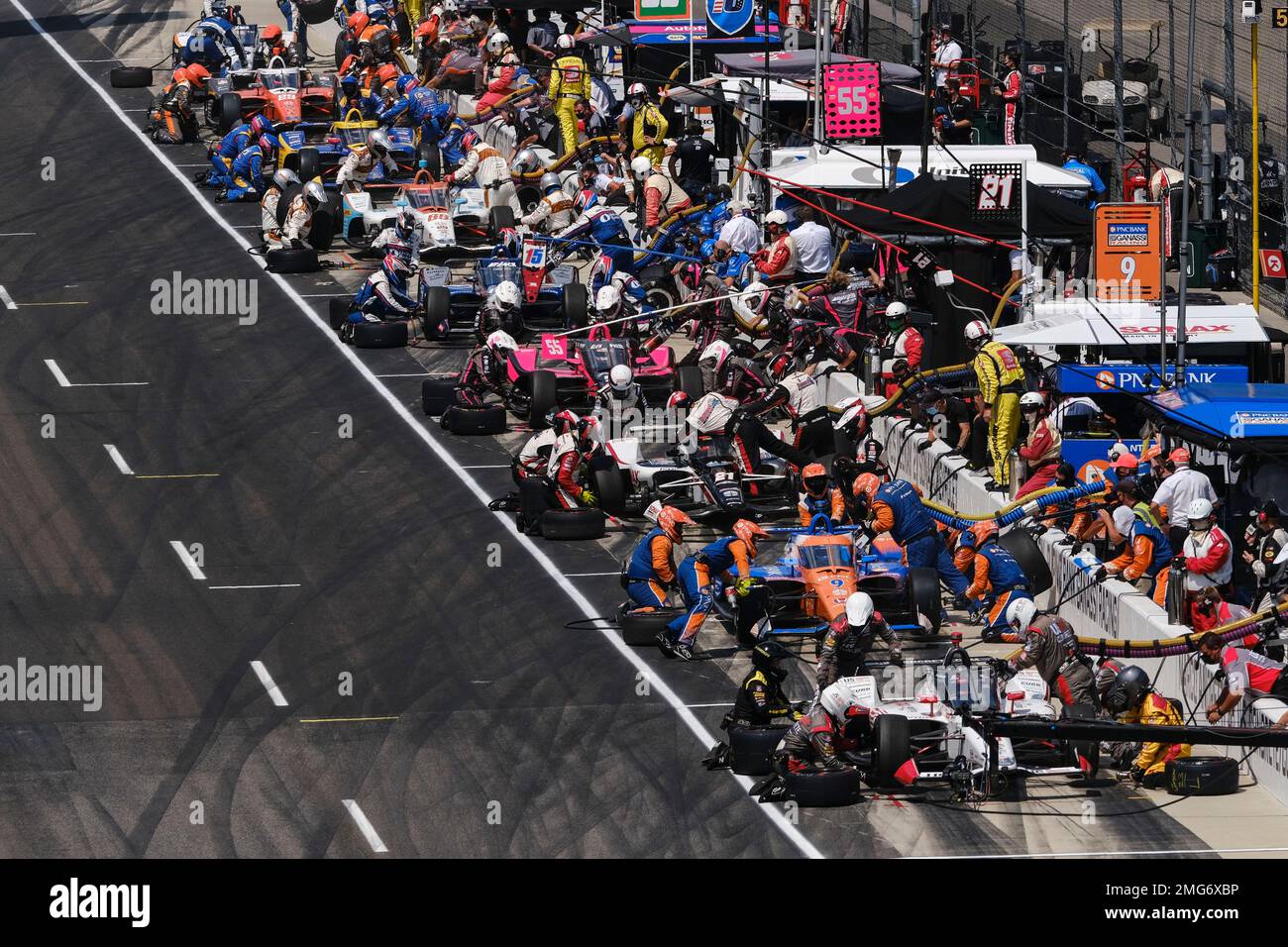 Cars pit early in the Indianapolis 500 IndyCar auto race at the ...