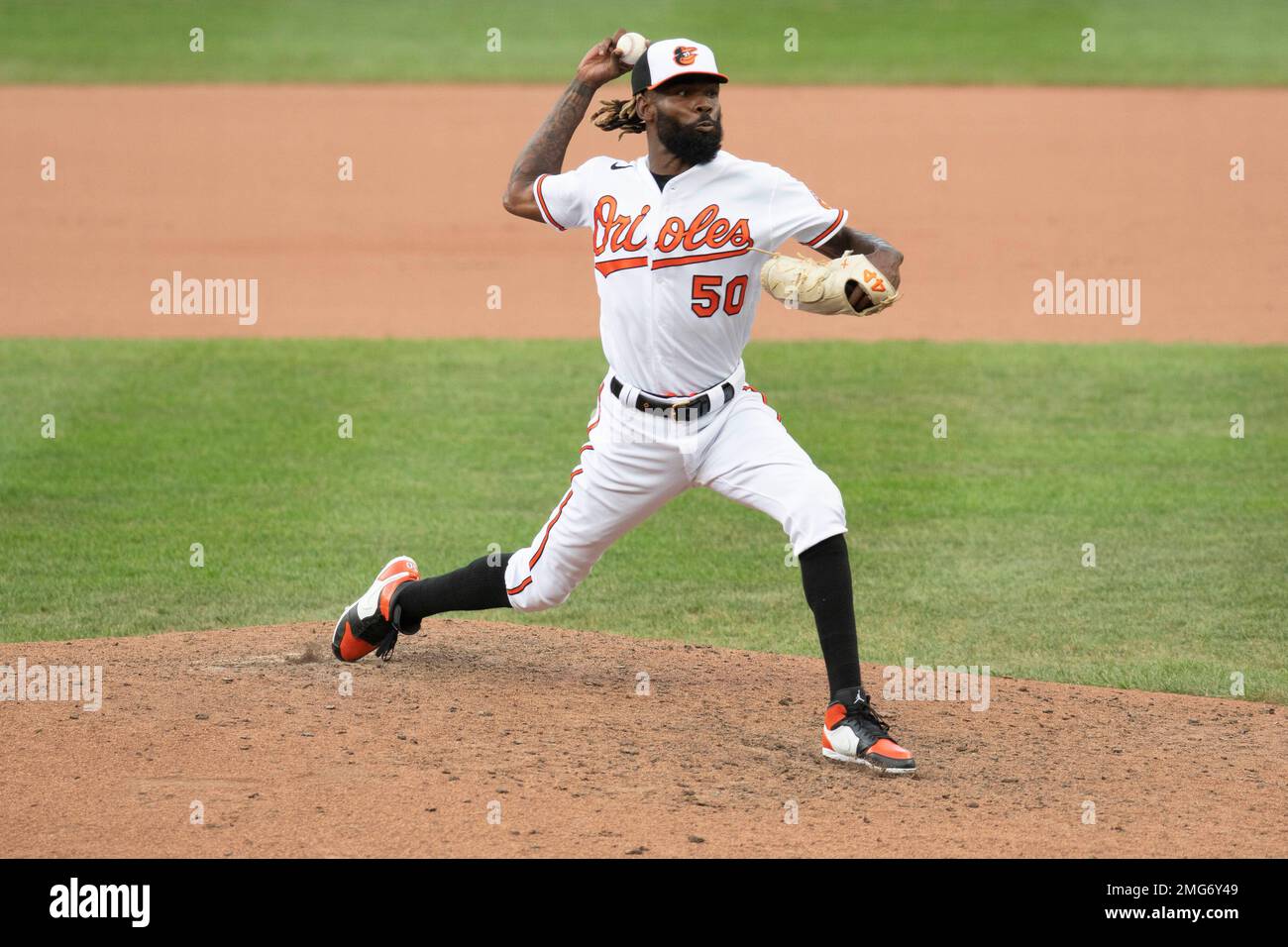 Baltimore Orioles relief pitcher Miguel Castro (50) delivers a pitch ...