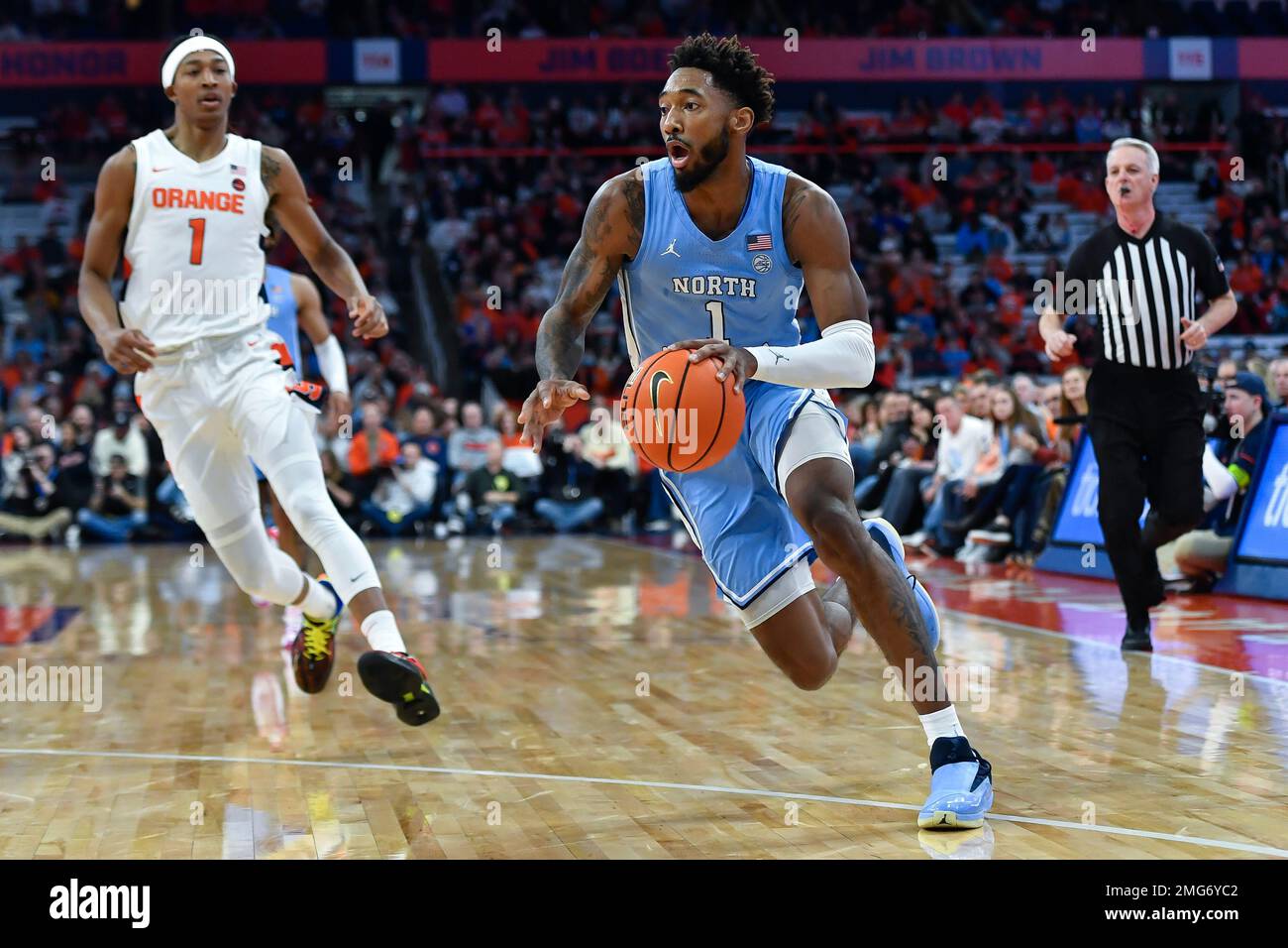 North Carolina forward Leaky Black, right, drives to the basket as ...