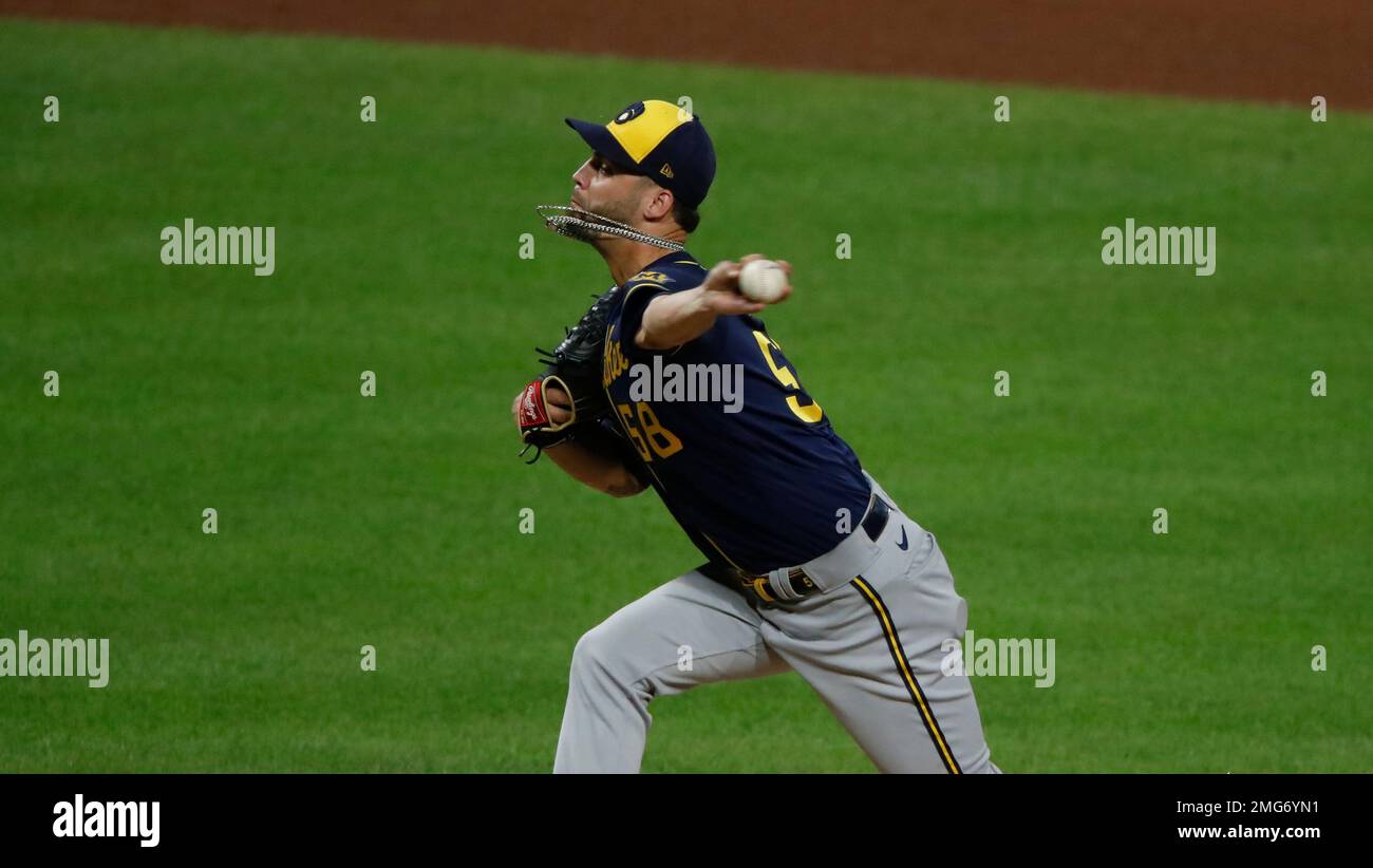 Milwaukee Brewers relief pitcher Alex Claudio delivers during the ...
