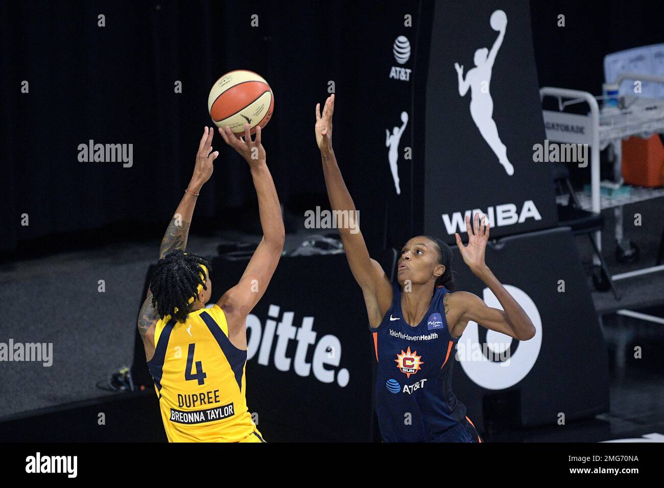 Indiana Fever forward Candice Dupree (4) attempts a shot in front of ...