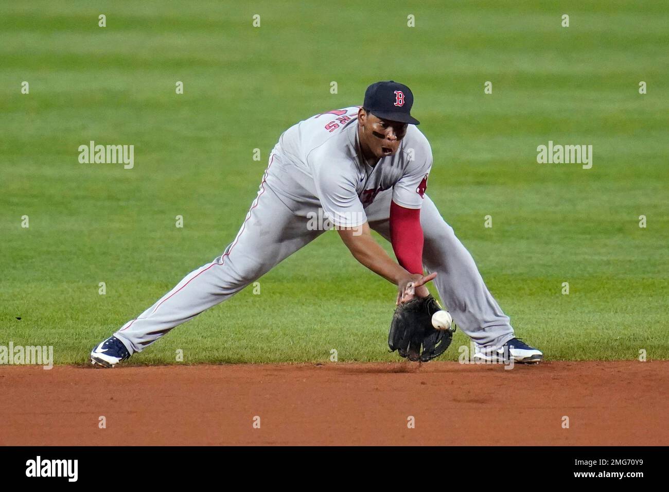 Boston Red Sox third baseman Rafael Devers fields a ground ball by ...