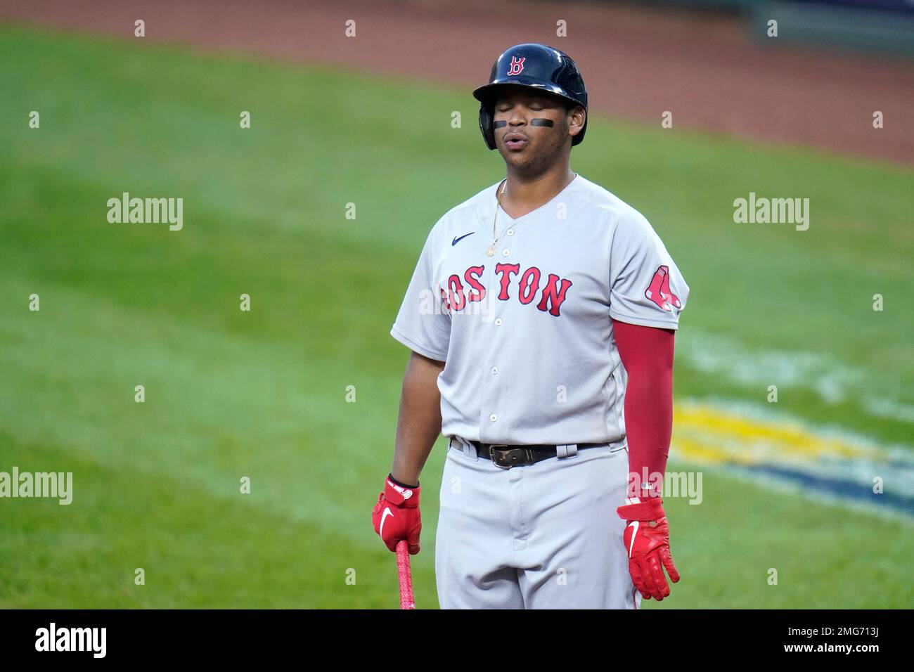 Boston Red Sox's Rafael Devers takes a deep breath before stepping into ...